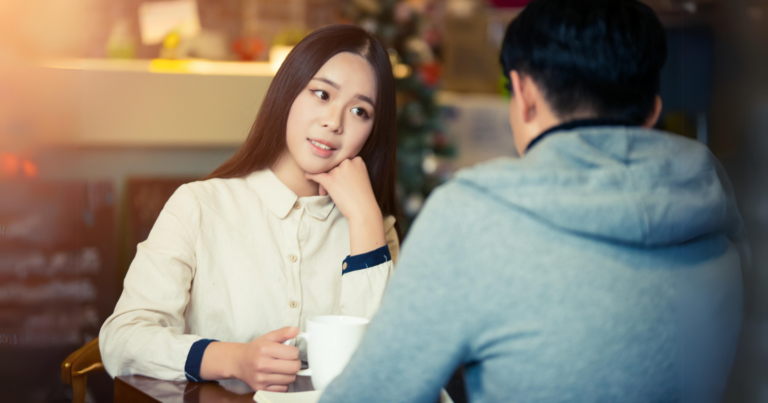 If someone is secretly attracted to you, they’ll show these 7 body language cues